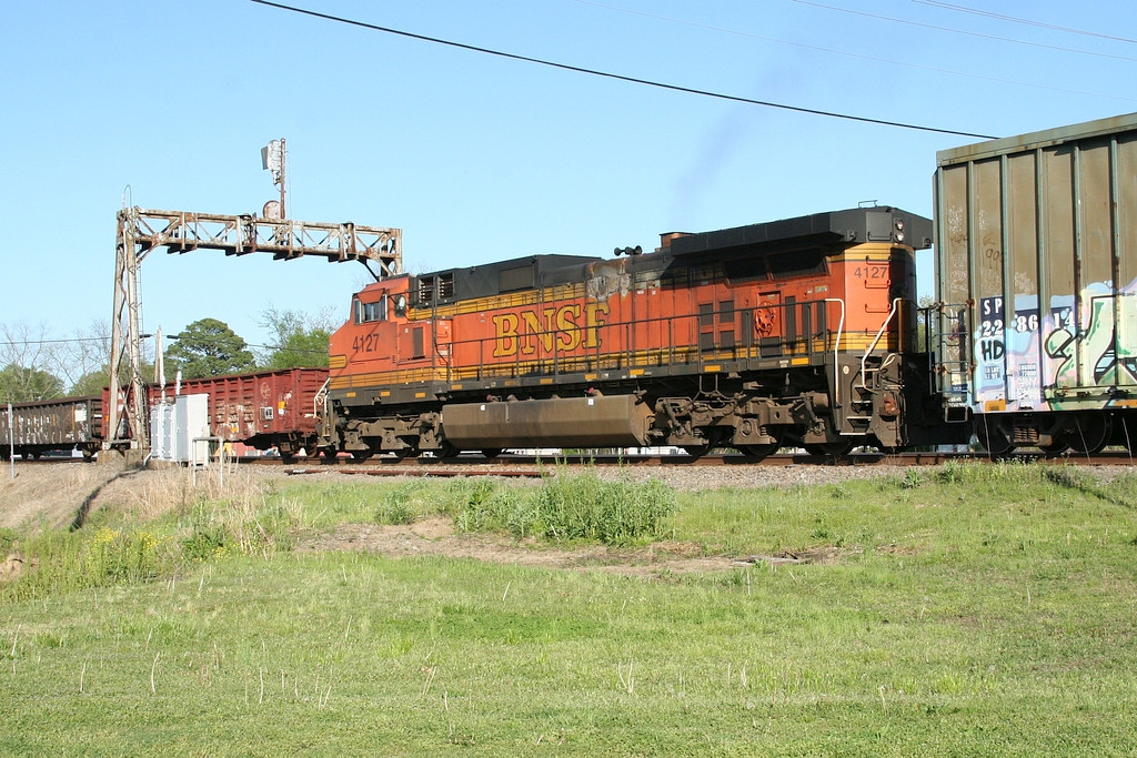 BNSF 4127 mid train helper under the signal bridge